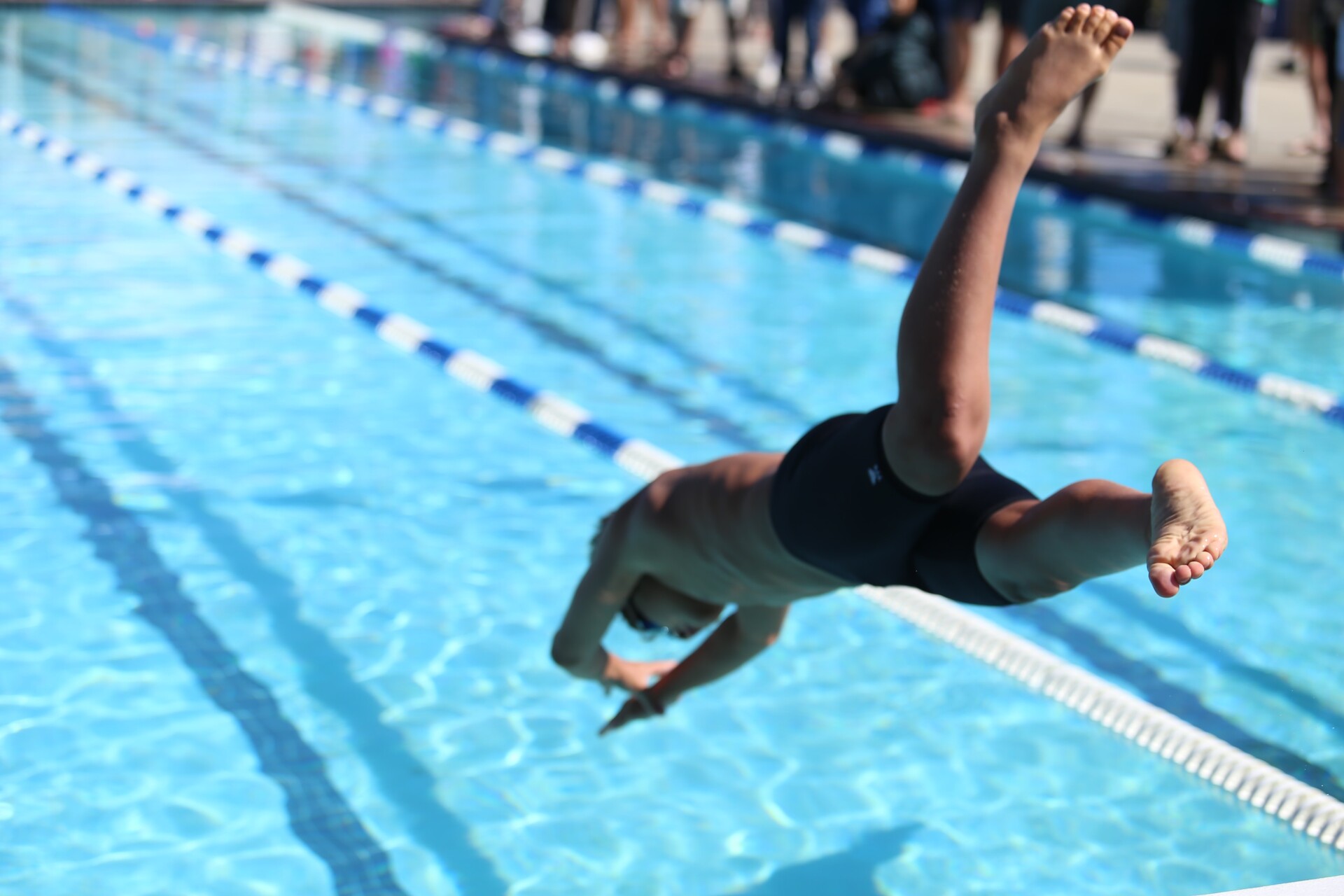 Diving Into A Swimming Pool